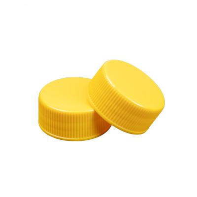China 38 MM Pesticide Plastic Bottle Cap Biodegradable Bottle Cap Ribbed Screw Cap for sale