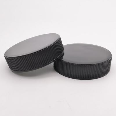 China 12mm Height Striped Edge Black Plastic Screw Cap For Toner Creams for sale