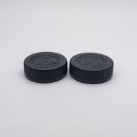 China Child Resistance 53/400 Black Bottle Cap With English Characters On Top for sale