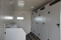 China Modern Steel Two Doors Flat Pack Container House For Public Shower Room for sale