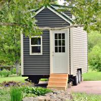 China New Zealand AZ150 Light Steel Prefab Mobile Home Trailer Caravans Tiny House On Wheels for sale