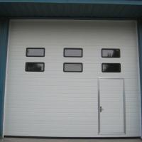 China 380V 50mm Polyurethane Foam Automatic Security Overhead Factory Roller Door for sale
