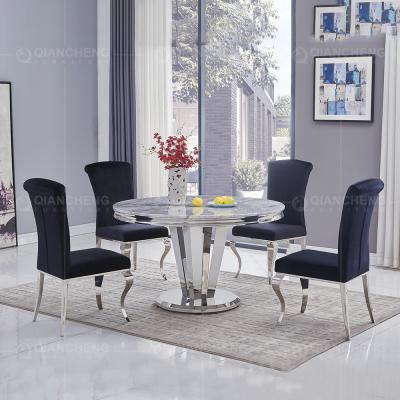 China Round Marble 0.34m3 SS Dining Tables Italian Modern Light Luxury Style for sale