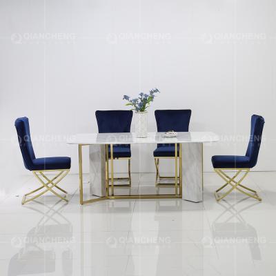 China modern 56kg Luxury Marble Dining Table Rugged Stainless Steel Base Rectangle Shape for sale