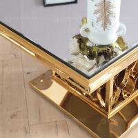 China Qiancheng ODM Tempered Glass Dining Table Golden Stainless Steel For Wedding for sale