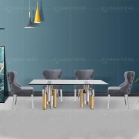 China Modern 12mm Thick Tempered Glass Top Dining Table With Stainless Steel Base for sale