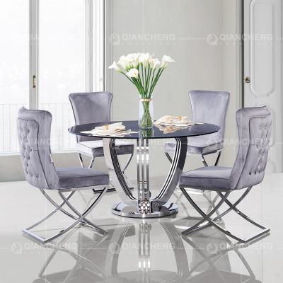 China Silver Mirror Dia 135cmx75cm Tempered Glass Dining Table ring shaped chrome legs for sale