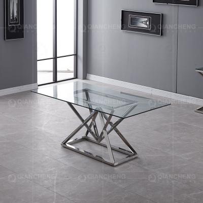 China 66kg 8 Seater Glass Dining Table With Steel Legs Rectangular Shape for sale