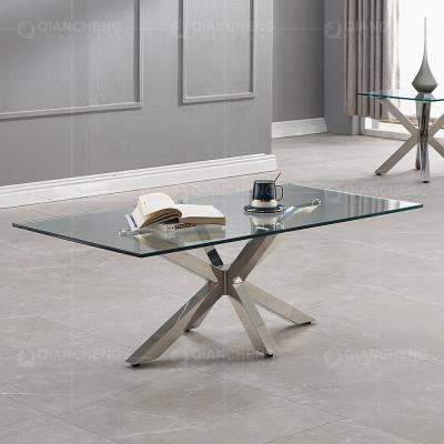 China Clear Glass Top 0.11cbm SS Coffee Table For Living Room With Brushed Chrome Base for sale