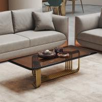 China Contemporary Round Coffee Table With Tempered Glass Brush Rose Gold Base for sale