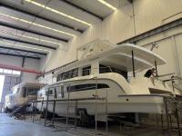 China 55ft Fiberglass Sailing Catamaran with Flybridge for Ocean Cruising and Yacht Charter for sale
