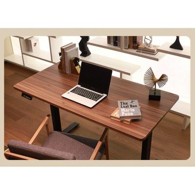 China Electric Sit Stand Up Desk Adjustable Metal Frame Brown 710 mm Height Office Furniture for sale