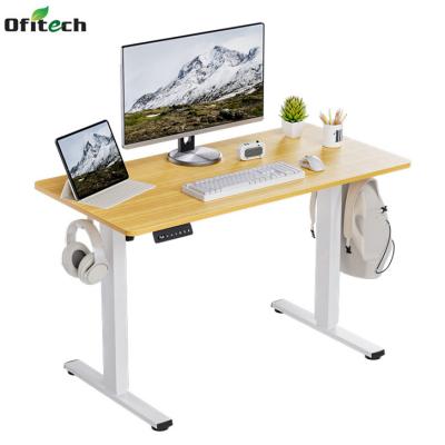 China 710 mm Height Adjustable Lifting Desk Custom Wooden Grain Walnut Electric Table Legs for sale