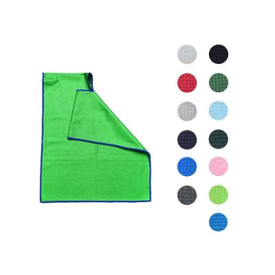 China Strong Water Absorbent Solid Color Waffle Microfiber Golf Towel With Hole for sale