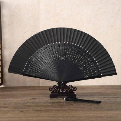 China Elegant Handmade Bamboo & Silk Folding Fan – Lightweight Purse-Size Accessory with Tassel for sale