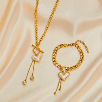 China Exaggerated Stainless Steel Crooked Heart Pearl Necklace & Bracelet Set for sale