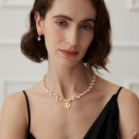 China Freshwater Pearls With Coin Pendant Necklace for sale