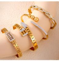 China Geometric Hollow Diamond Inlay Paved Zircon Bangles Titanium Steel Gold Plated Bracelet Z051 for sale