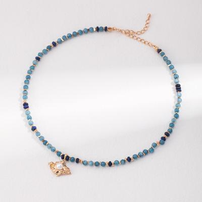 China Gold Natural Pearl Encased Pendant Necklace with Aquamarine and Lapis for sale