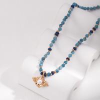 China Gold Natural Pearl Encased Pendant Necklace with Aquamarine and Lapis for sale