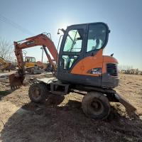 China Used Doosan DX60 tyre  excavator for sale