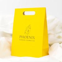China Clothing Packaging Die Cut Handle Shopping Kraft Paper Bag Customized Yellow Gift Bags for sale