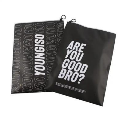 China Custom Printed Logo CPE Plastic Slider Zipper Bags for sale
