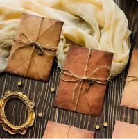 China Antique Kraft Paper Envelopes Set With Rope And Metal Pendants For Retro Letter Gift Card Packaging for sale