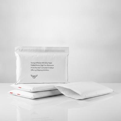 China Strong Adhesive With Strip Paper Padded Mailer High Tear Resistance Protective And Cushioned Envelope Offering Shipping Solutions for sale