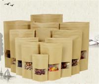 China Customized Zipper Kraft Paper Stand Up Pouch With Tear Notch Food Packaging for sale