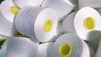 China 45S/2 Poly Poly Core Spun Thread Raw White Bright High Strength Excellent Evenness for sale