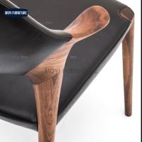 China Wabi Sabi Italian Modern Solid Wood Dining Chair with Comfortable Armrests for Home and Cafe Use for sale