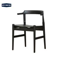 China Carbonized Black Horn Solid Wood Dining Chair with Foam Fabric Upholstery - Modern Design for Comfortable Seating for sale