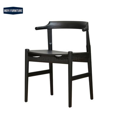 China Carbonized Black Horn Solid Wood Dining Chair with Foam Fabric Upholstery - Modern Design for Comfortable Seating for sale