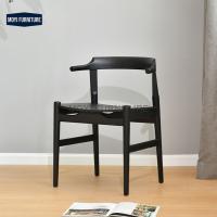 China Carbonized Black Horn Solid Wood Dining Chair with Foam Fabric Upholstery - Modern Design for Comfortable Seating for sale
