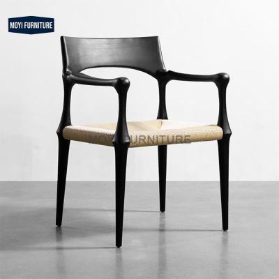 China Modern Solid Wood Retro Dining Chair with Rattan Accents - Black Ergonomic Armchair for Conference and Leisure Seating for sale
