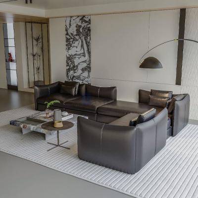 China Modular Modern Italian Minimalist Black Leather Sofa with Down-Filled Cushions and Corner Configuration for Large Living Spaces for sale