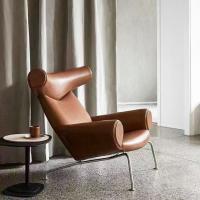 China Leather Wood Metal Designer Living Room Chair Luxury Lounge Armchair Modern Wing Back Accent Chair 32-36 Inch Height for sale