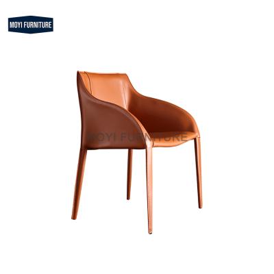China Standard Size Dining Chair Stable Metal Legs Italian Design Home Leisure Saddle Leather Armrest Chair for Restaurant Hotel for sale