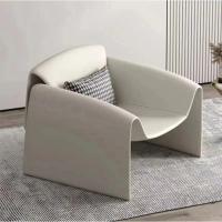 China Leather Wood Metal Comfortable Leisure Chair Modern Minimalist Art Living Room Balcony Lounge Chair Nordic Light Luxury Designer for sale
