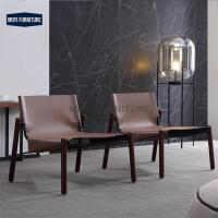 China Apartment Chic MOYI Design Leisure Brown Leather Metal Chair Frames Luxury Solid Wooden Living Room Chairs Surface Carpet for sale