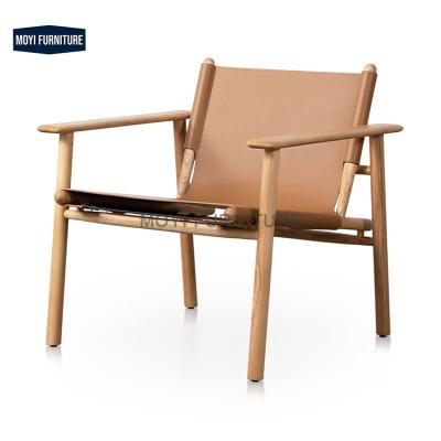 China Custom Designer Italian Balcony Solid Wood Chair with Log Armrest Designer Saddle Leather Leisure Seating Home Furniture for sale