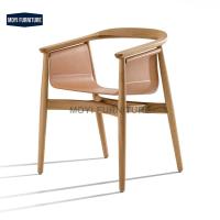 China Dining Room Furniture Italian Solid Wood Armchair Modern Curved Backrest Dining Chair With Saddle Leather Seat for sale