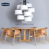 China Dining Room Furniture Italian Solid Wood Armchair Modern Curved Backrest Dining Chair With Saddle Leather Seat for sale