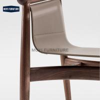 China Dining Room Furniture Italian Solid Wood Armchair Modern Curved Backrest Dining Chair With Saddle Leather Seat for sale