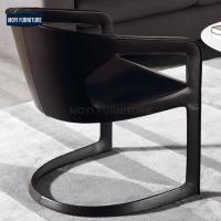 China Modern New Design Leather Dining Chair Hotel Villa Black Metal Frame S Shape Restaurant Armchair Furniture for sale