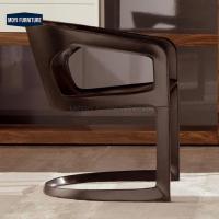 China Modern New Design Leather Dining Chair Hotel Villa Black Metal Frame S Shape Restaurant Armchair Furniture for sale