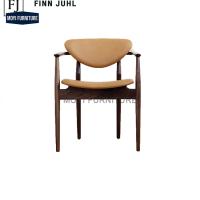China Danish Designer Dining Chair Dining Room Furniture Solid Wood Leather Sofa Side Chair Creative Dining  Chair for sale