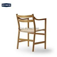 China Arm Dining Chair Made of Solid Ash Wood Frame with Woven Rattan on the Seat for Indoor and Outdoor Use for sale