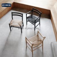 China Arm Dining Chair Made of Solid Ash Wood Frame with Woven Rattan on the Seat for Indoor and Outdoor Use for sale